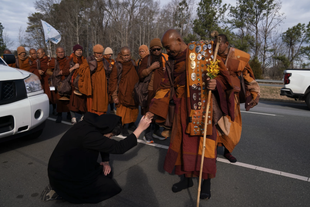 Buddhist monks on national Walk for Peace receive flowers, tears, and ...